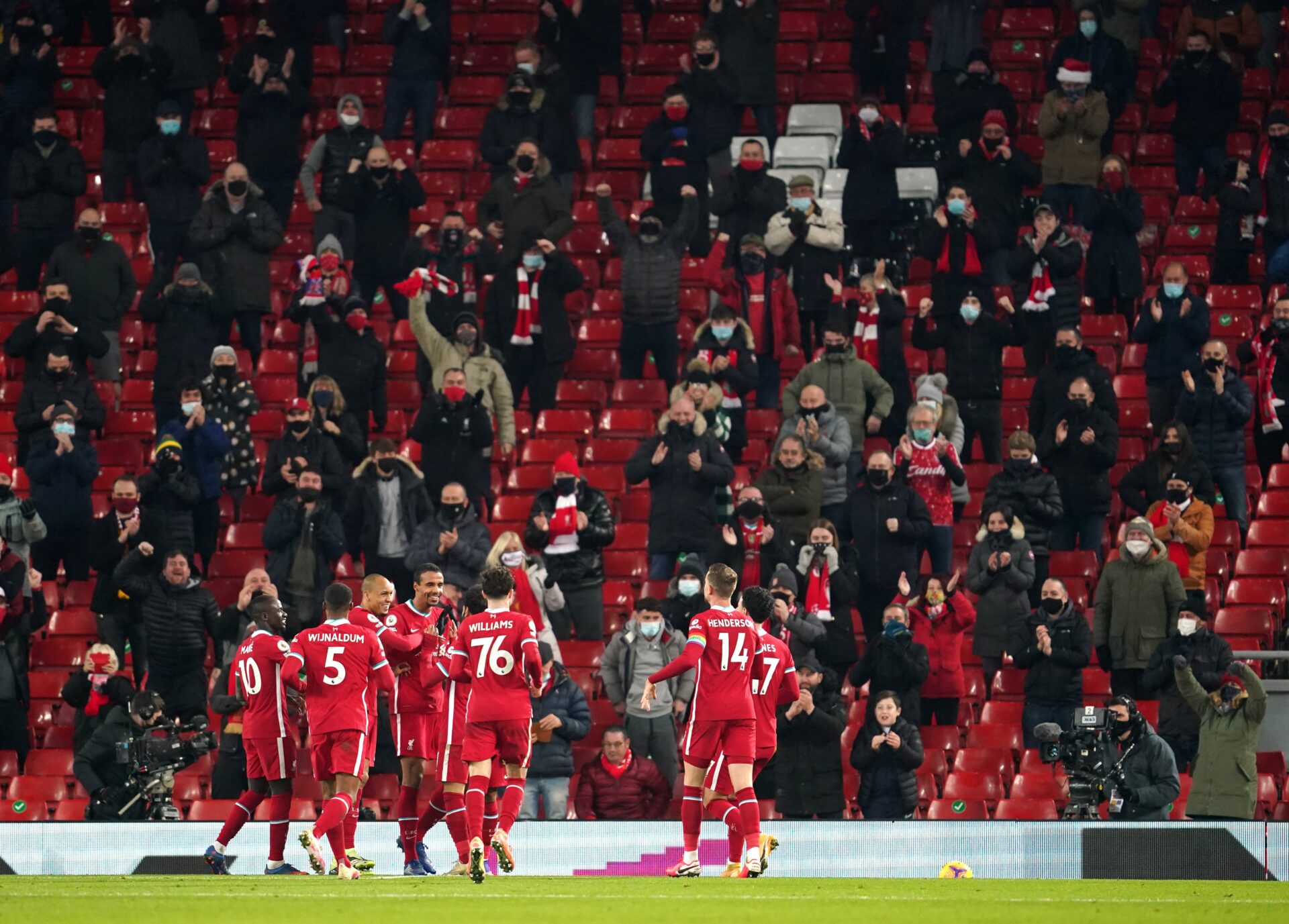 In Photos: All smiles at Anfield as fans return on "perfect night" for ...